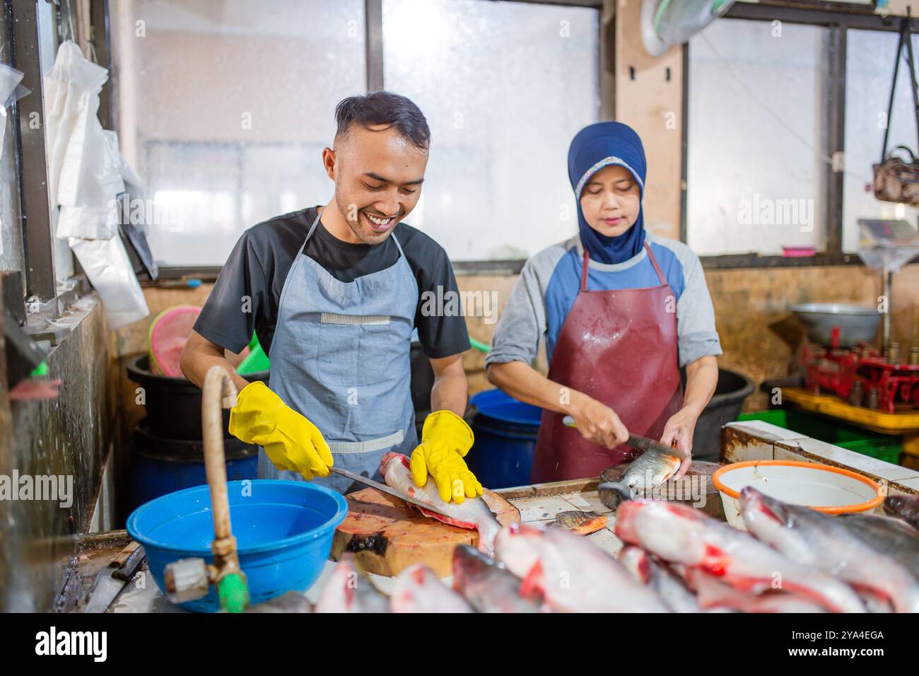 Vibrant Fish Market Stall showcasing Fresh Seafood prepared by Local Vendors Stock Photo - Alamy