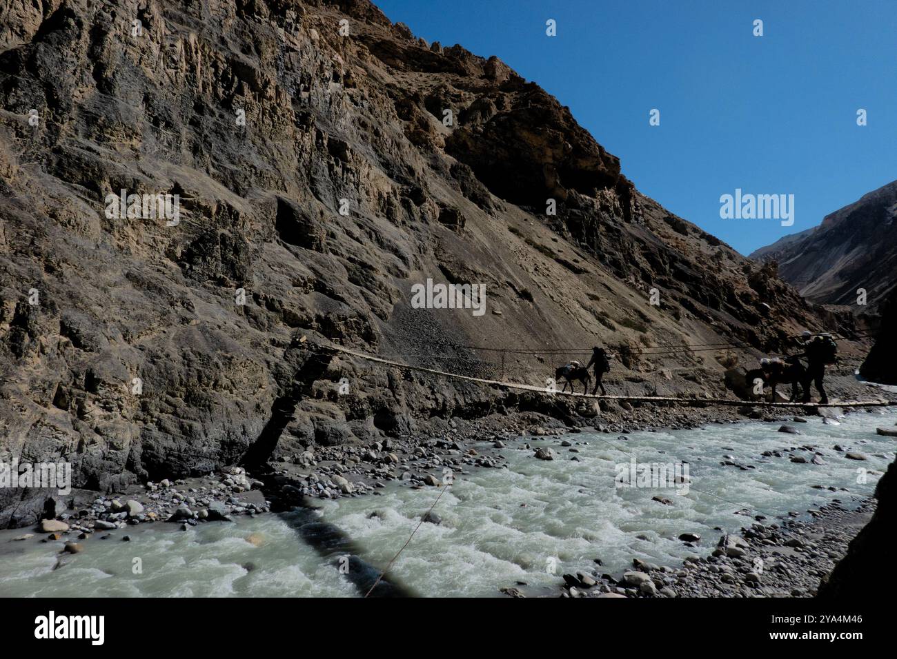 Crossing the river on the Shimshal Pass trek, Shimshal, Gojal, Pakistan ...