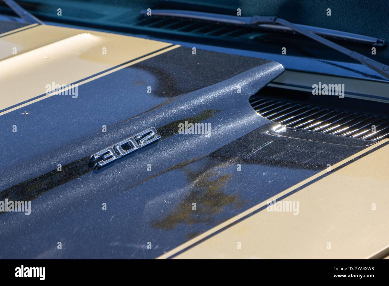 Closeup of the hood of a chevrolet camaro z28, showing the iconic 302 ...