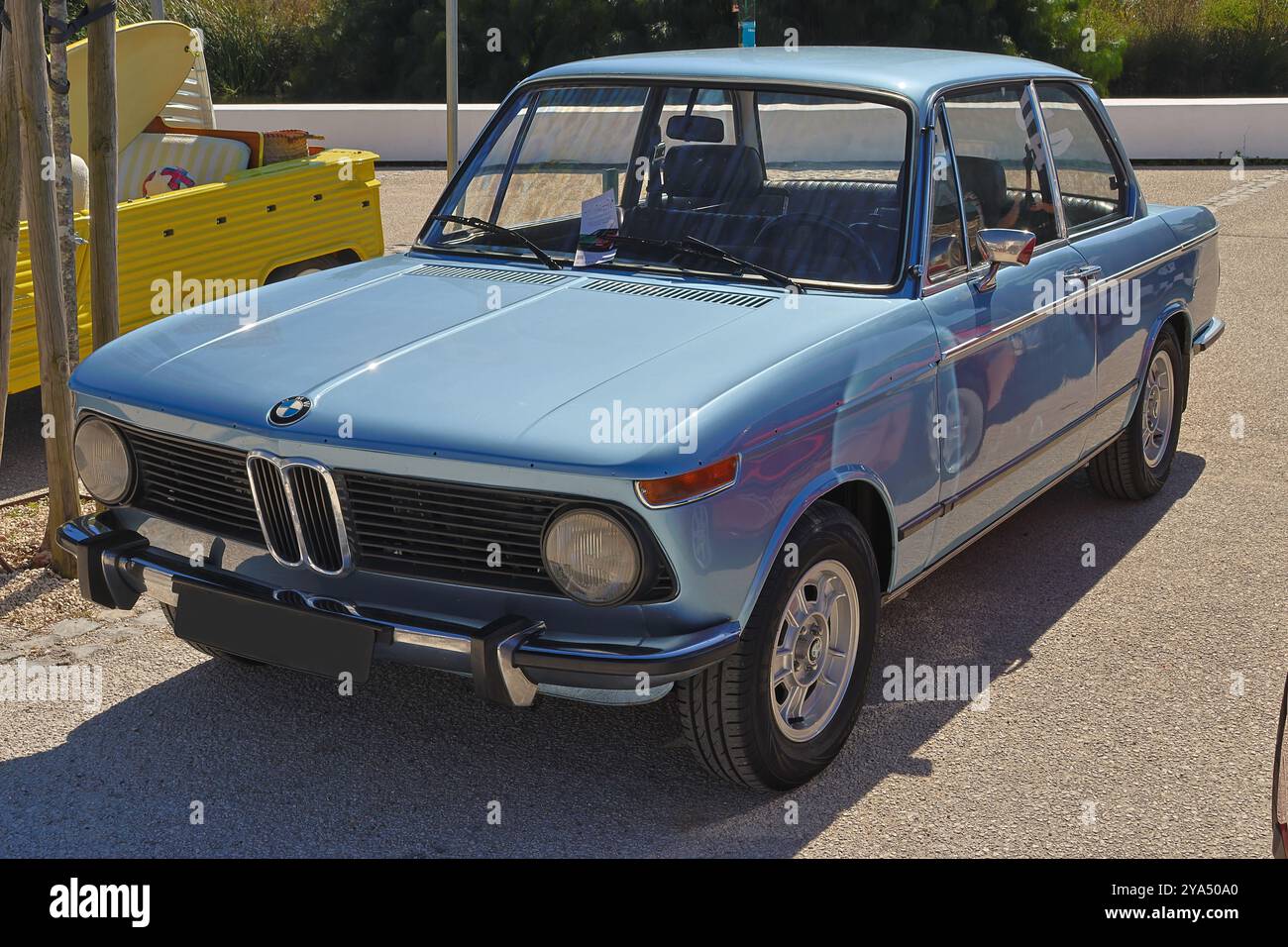 Pristine bmw 2002 with a shiny light blue paint job is parked on the ...