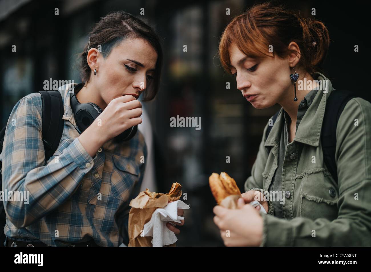 College students enjoying snacks during a break outdoors Stock Photo ...
