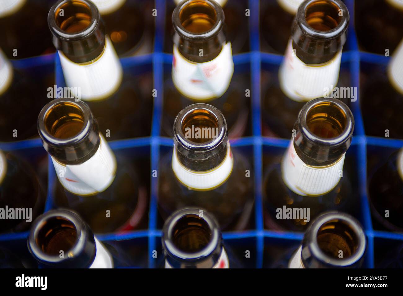 Visual game with nine empty beer bottle necks Stock Photo - Alamy