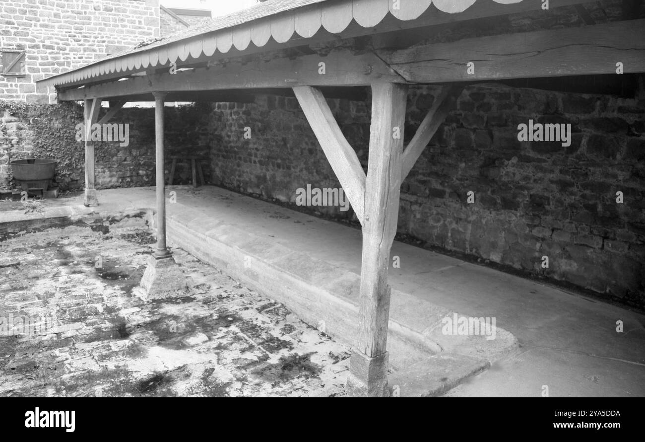 A view of the ancient lavoir, in the village of Saint-Fraimbault ...
