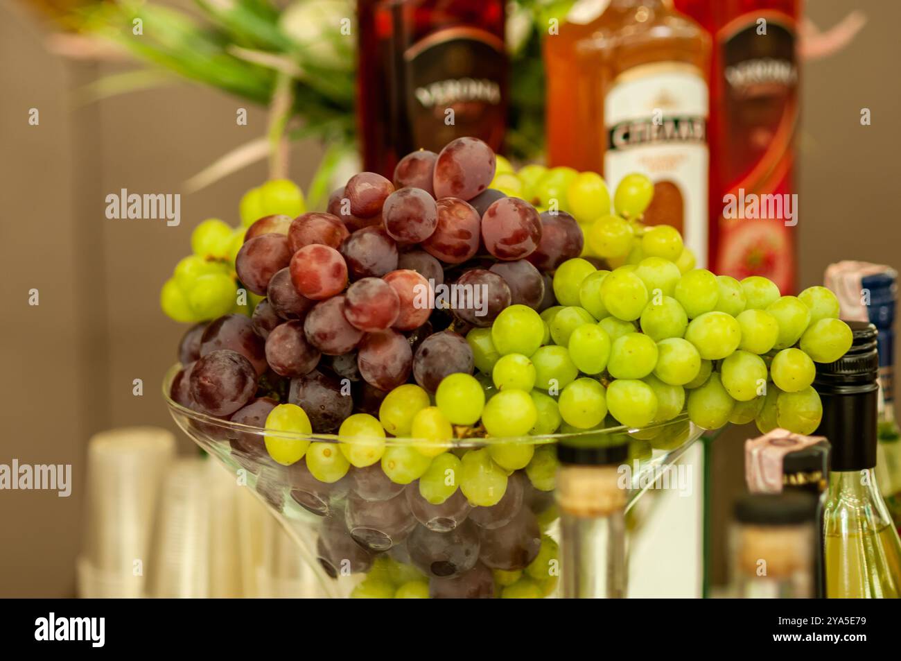 Exquisite Grapes Arrangement in a Stylish Cocktails Setting Stock Photo ...