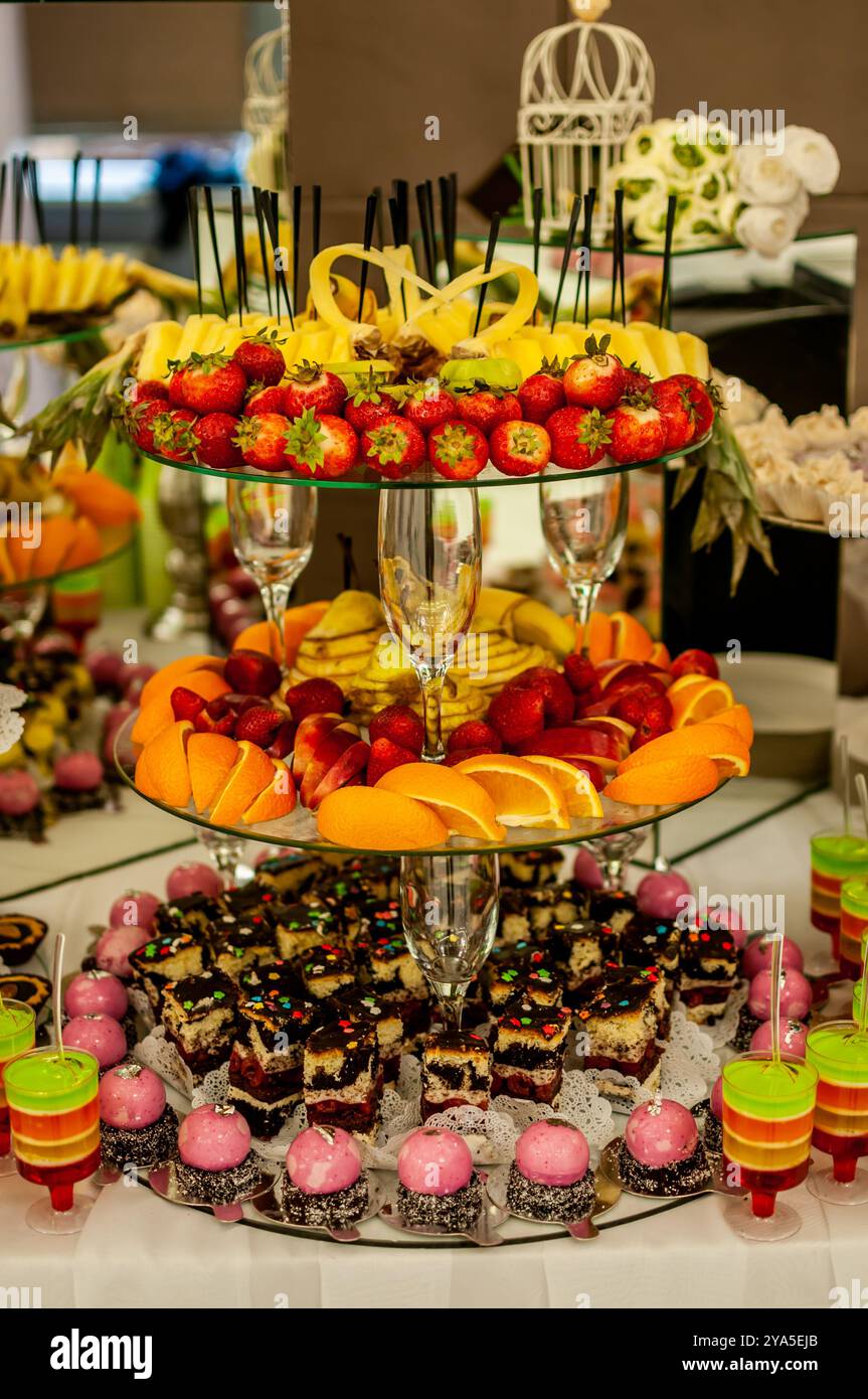 A Vibrant Display of Exquisite Desserts and Fresh Fruits on Elegant ...