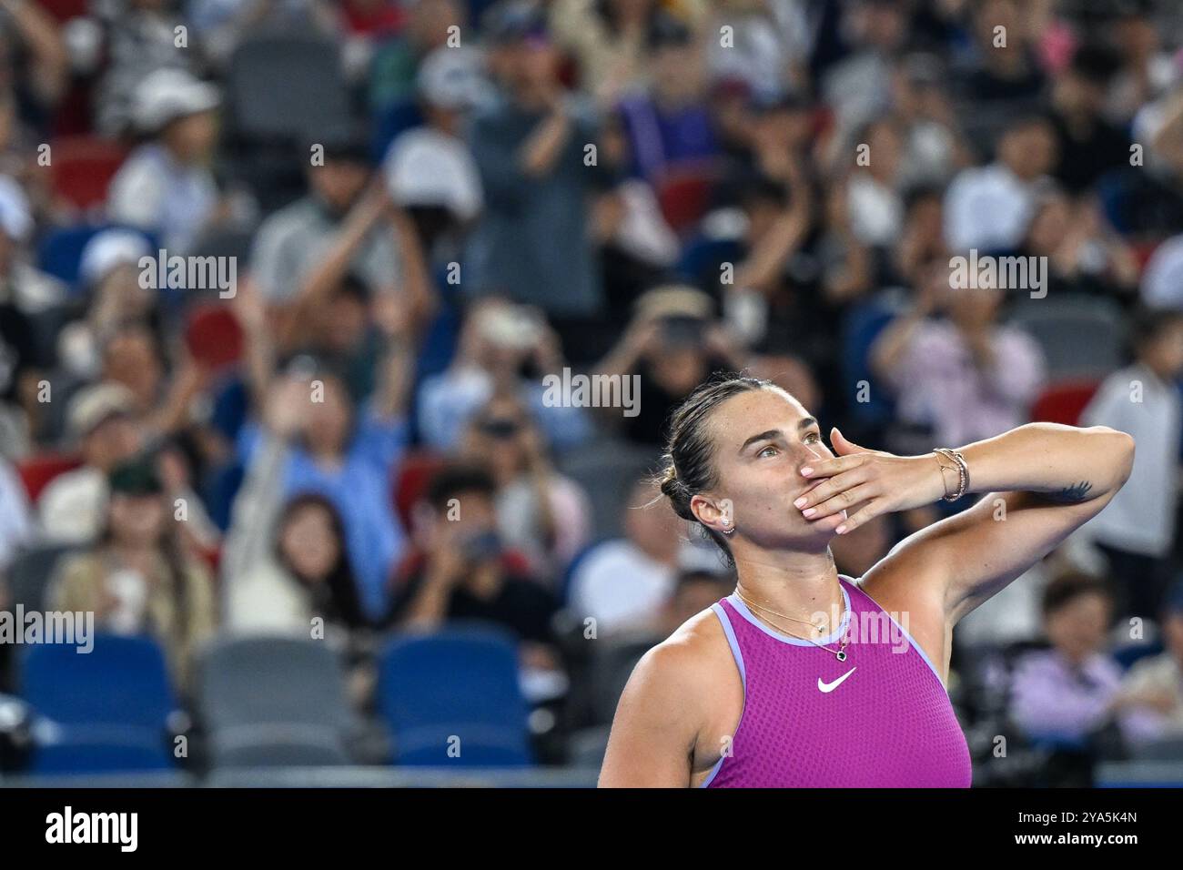 Wuhan, China's Hubei Province. 12th Oct, 2024. Aryna Sabalenka greets ...