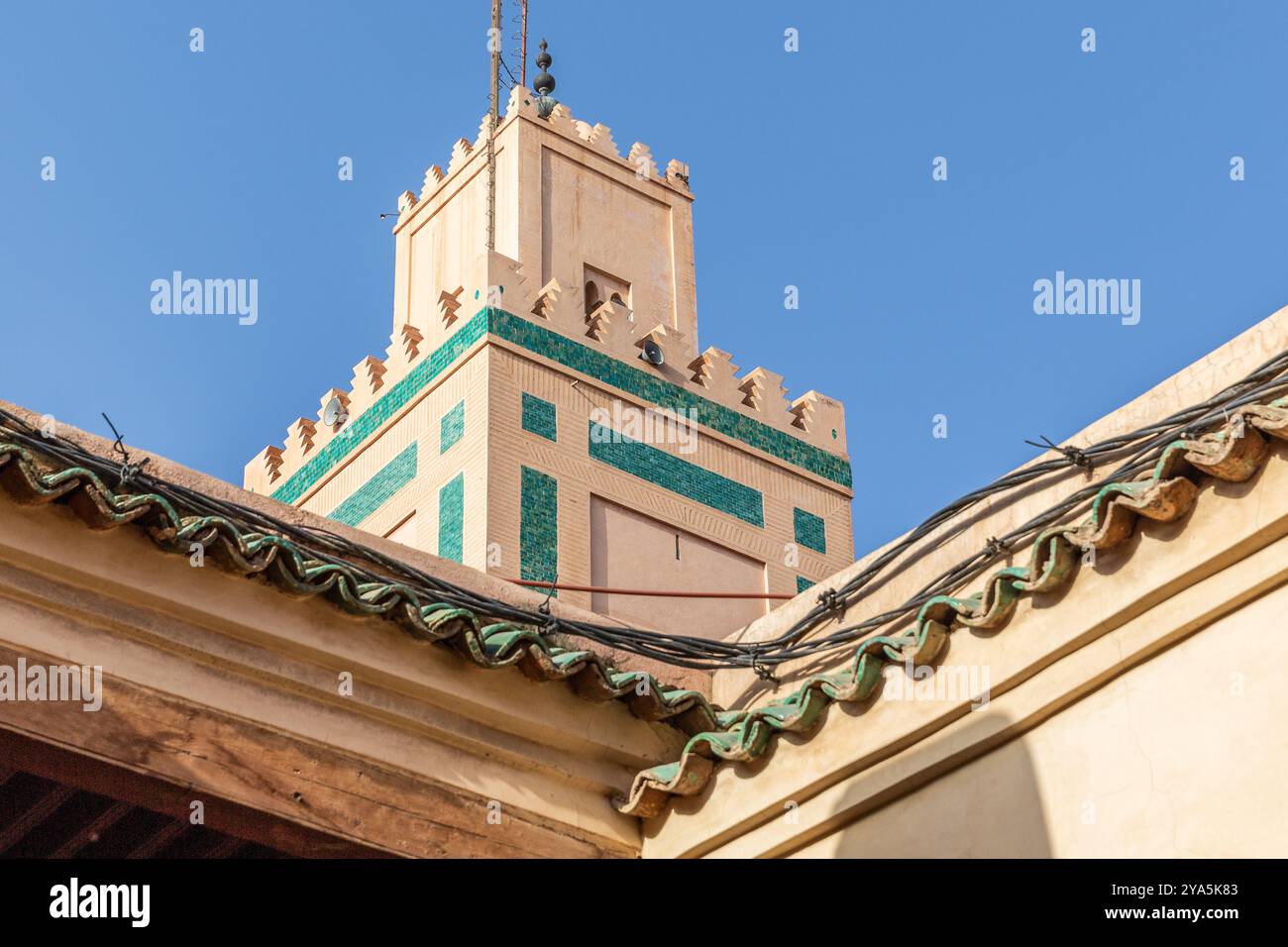 Minaret of the Ben Youssef Mosque in the heart of the medina of ...
