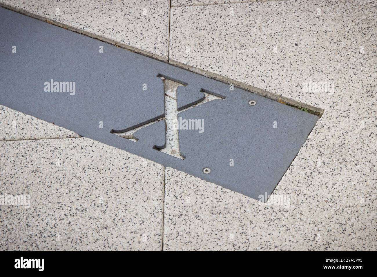 Roman numerical number ten made of stone tiles on street in city Stock ...