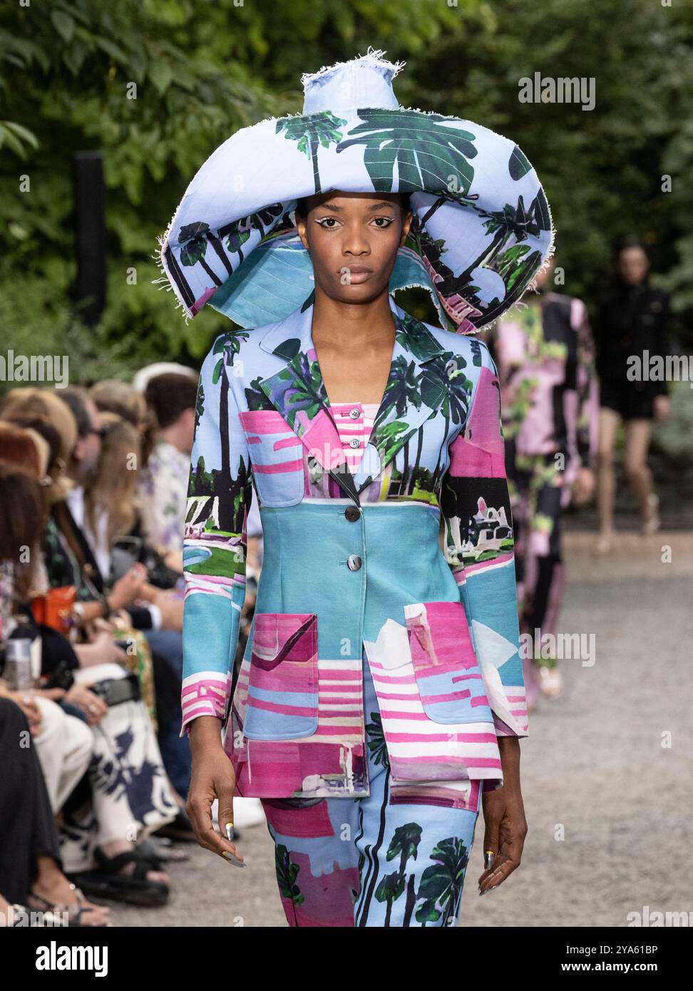 A model walks the runway for the Libertine by designer Johnson Hartig ...