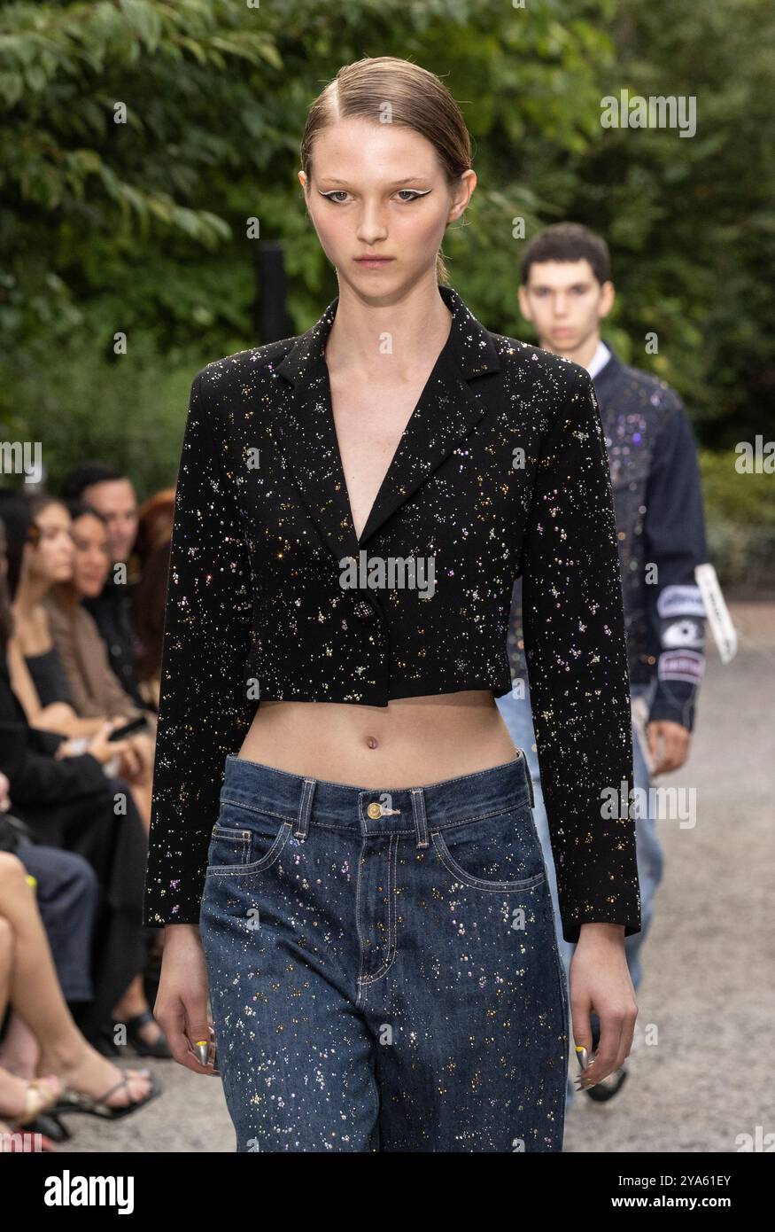 A model walks the runway for the Libertine by designer Johnson Hartig ...