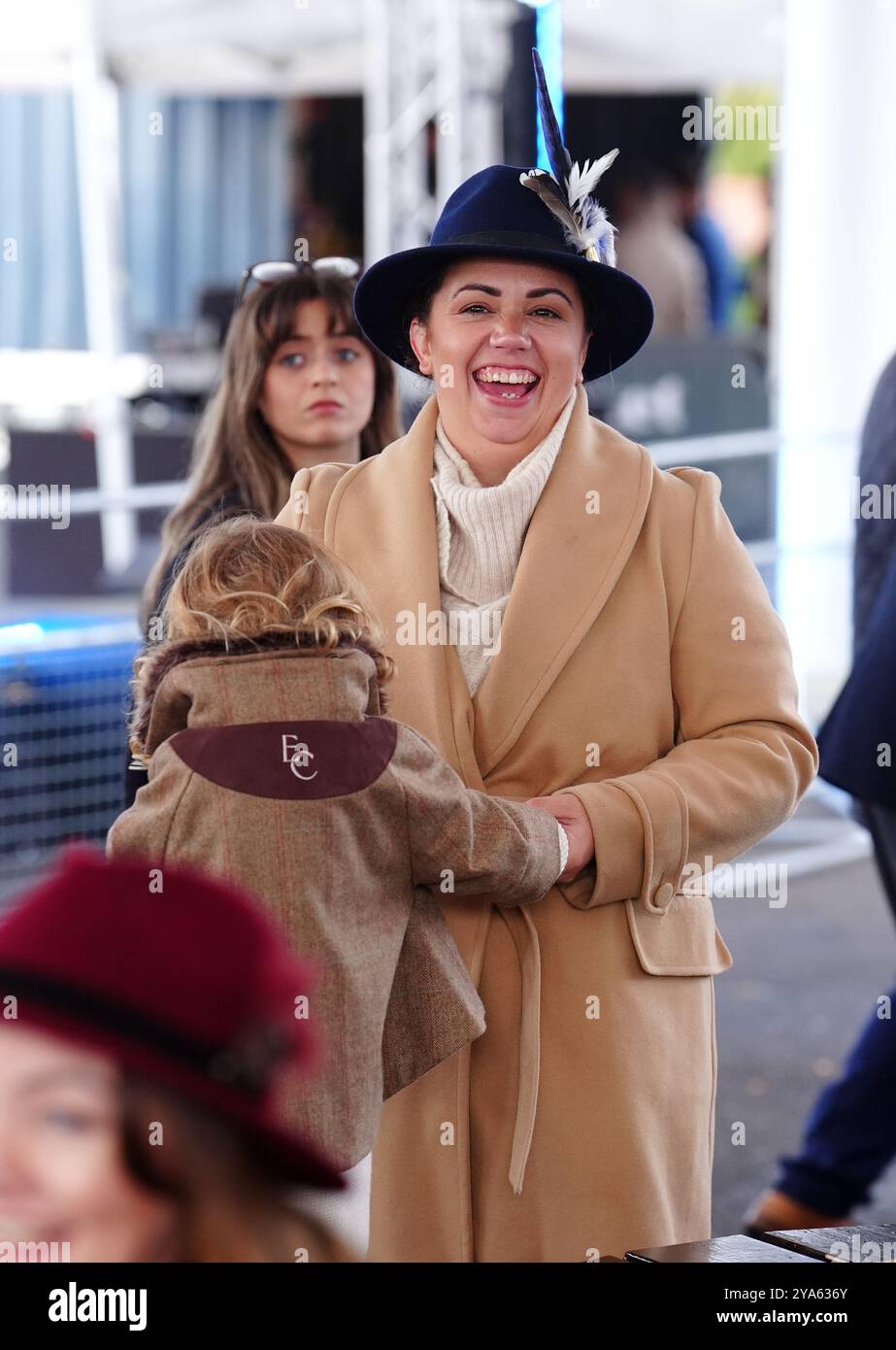 Racegoers dancing to music during Dubai Future Champions Day at ...