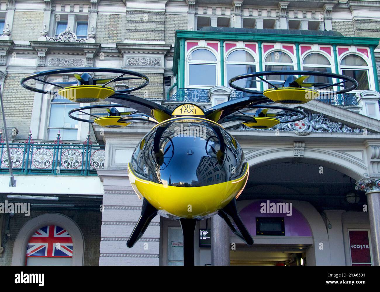 A prototype flying Taxi on display in the forecourt of Charing Cross ...