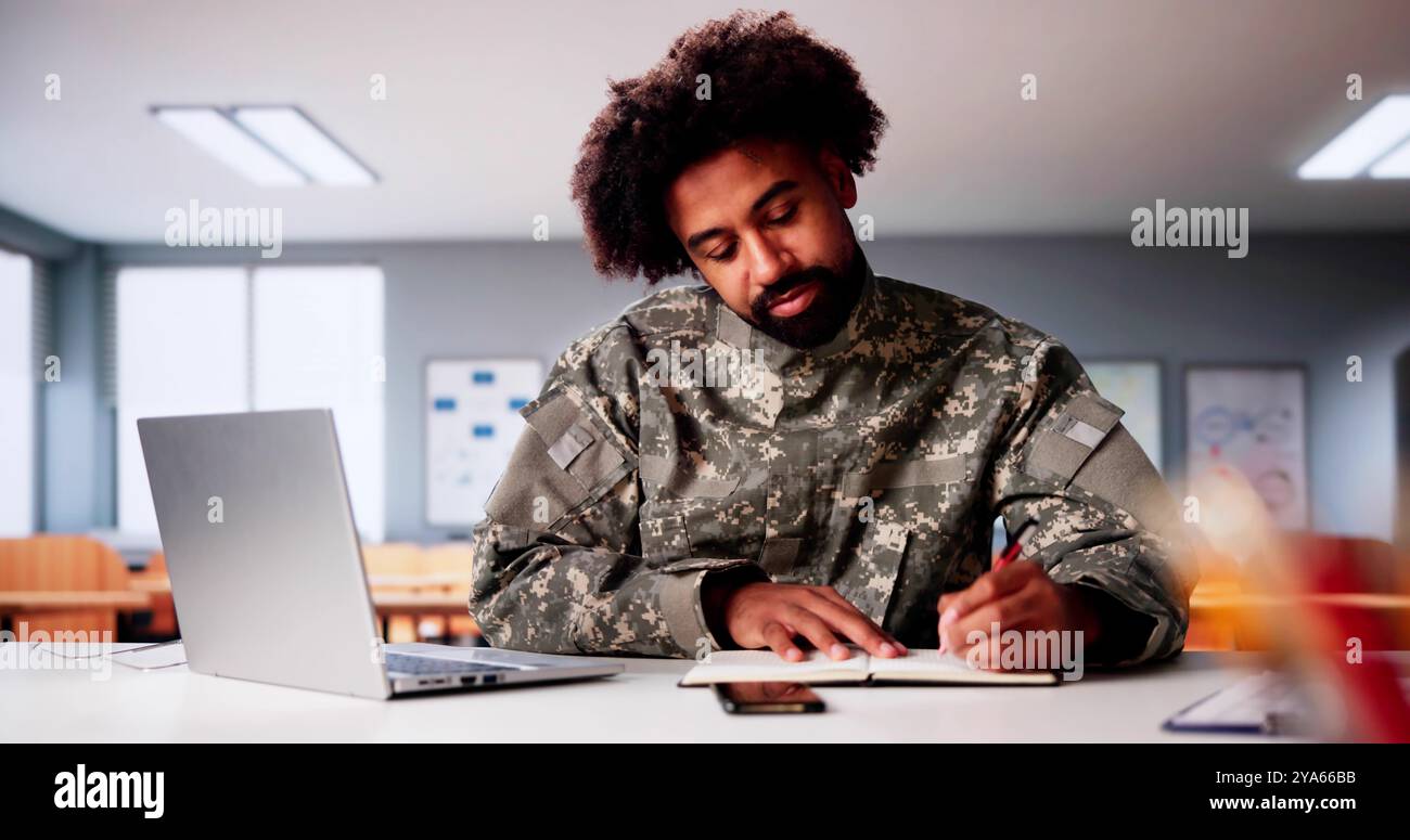 Military Student Education. Army Soldier Veteran With Computer Stock ...