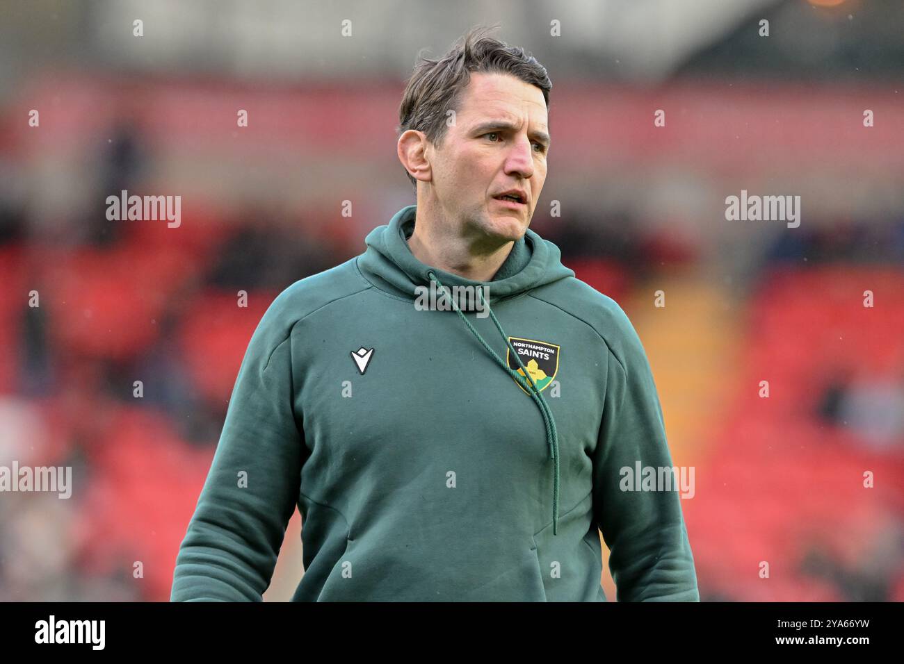 Phil Dowson Director of Rugby of Northampton Saints watches on the warm ...