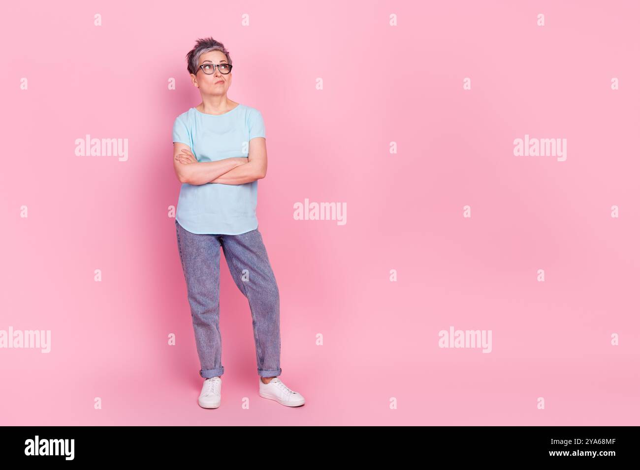 Full body portrait of nice aged lady folded arms look empty space ...
