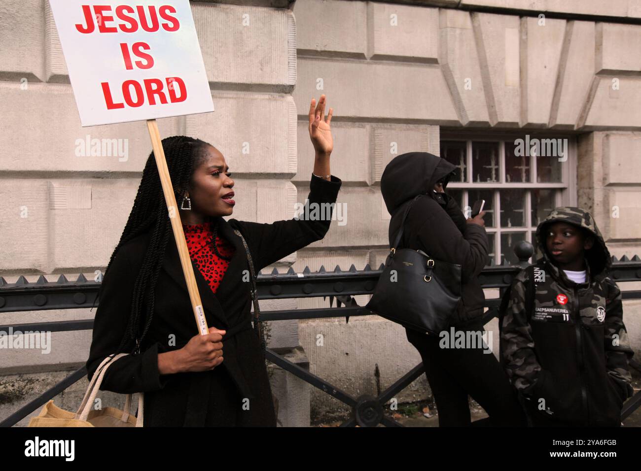 London, England, UK. 12th Oct, 2024. A supporter holds a sign saying ...