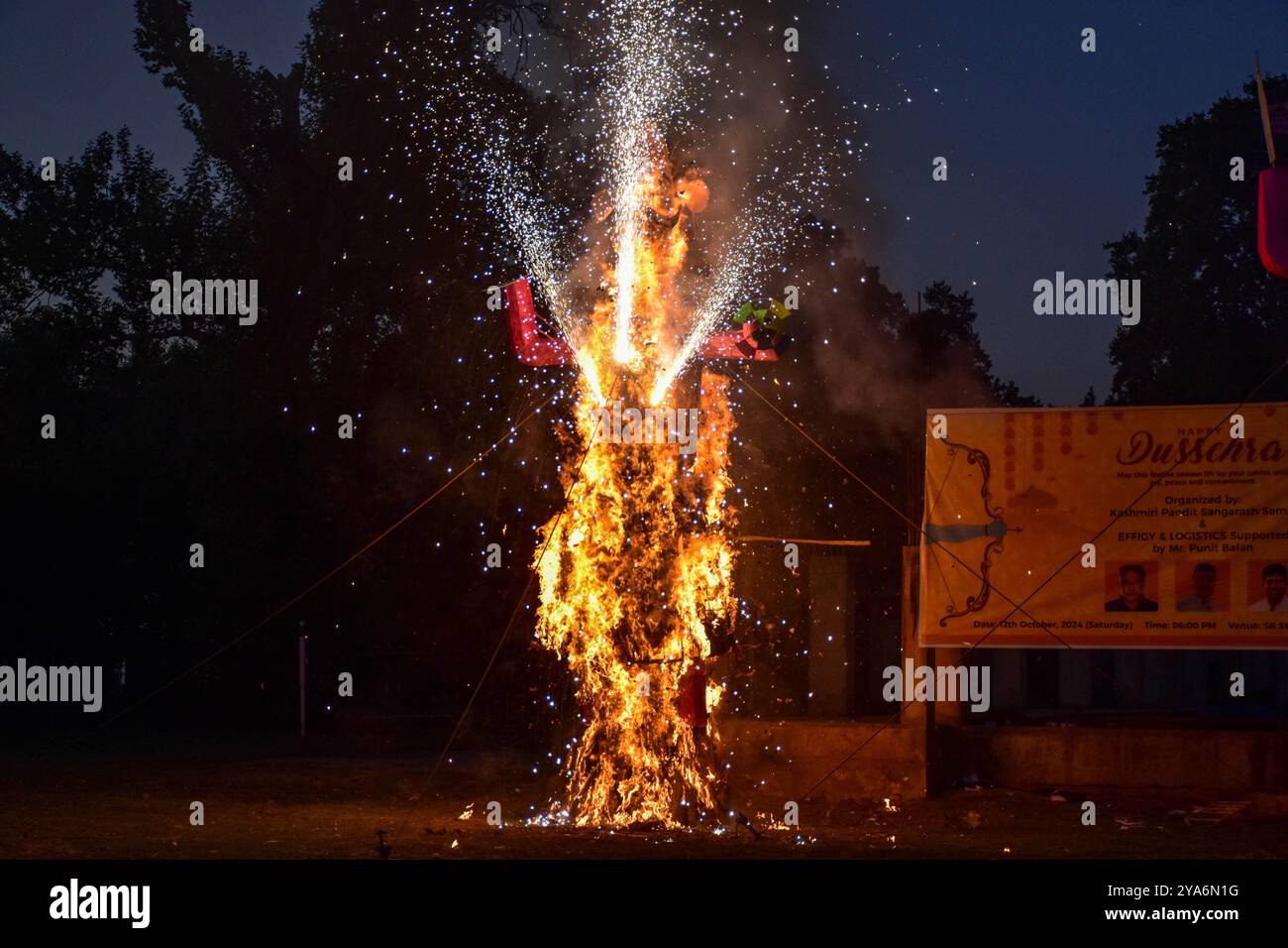 An effigy of demon king Ravana goes up in flames during the Dussehra ...