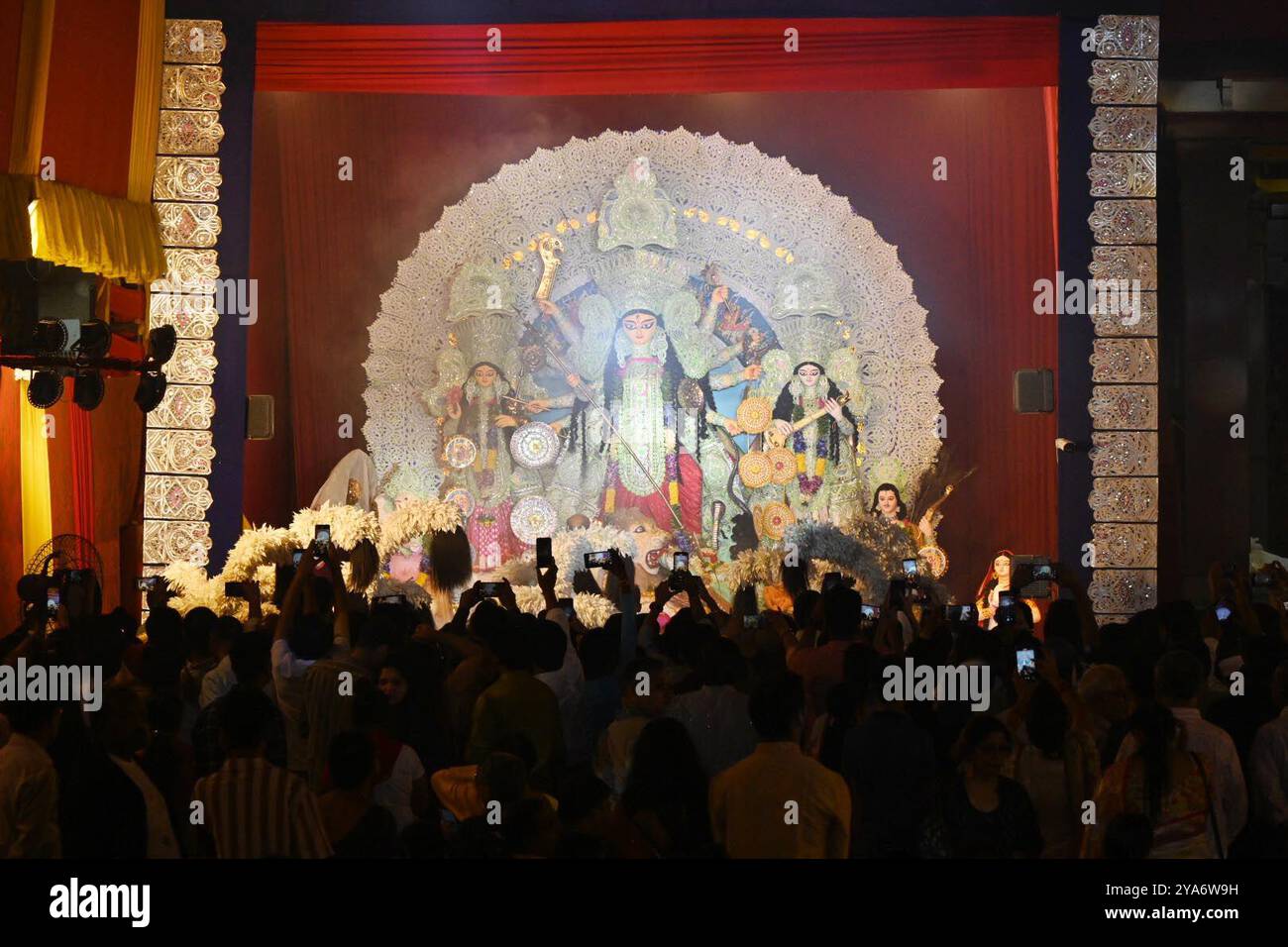 New Delhi, India. 12th Oct, 2024. NEW DELHI, INDIA - OCTOBER 12: Devotees celebrate Durga Puja ...