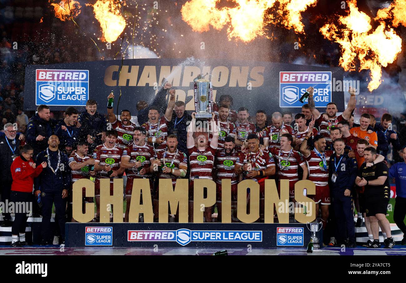 Wigan Warriors' Liam Farrell lifts the Super League Grand Final trophy ...
