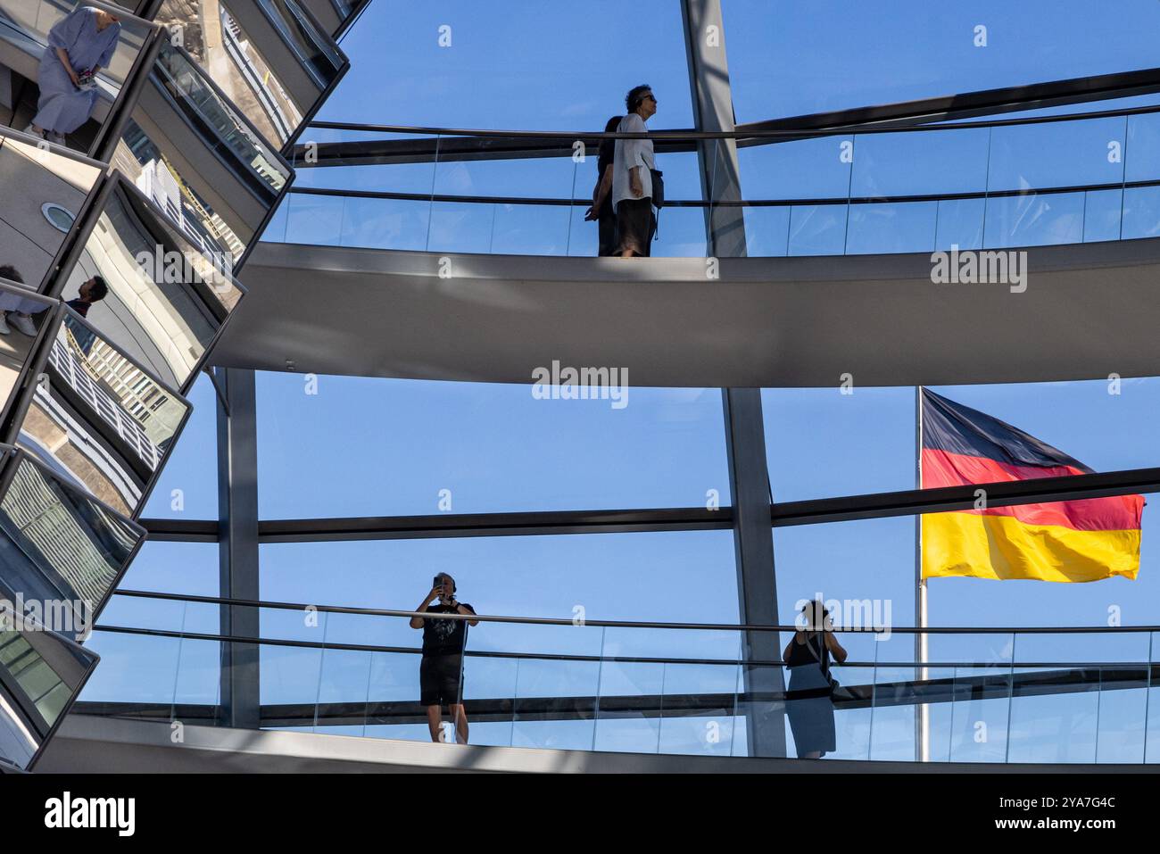 People in the Reichstag building dome, glass dome open to visitors on ...