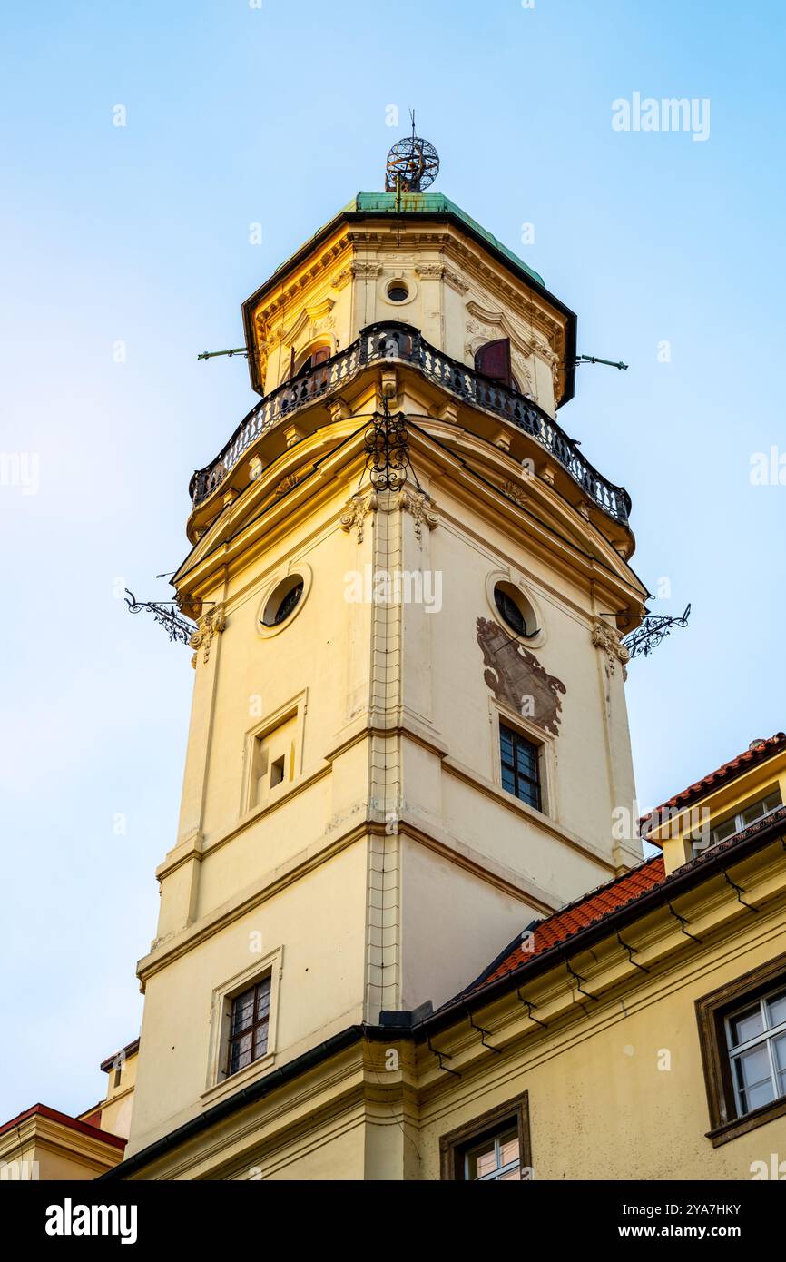 The Klementinum Astronomical Tower rises against a clear sky in Prague ...