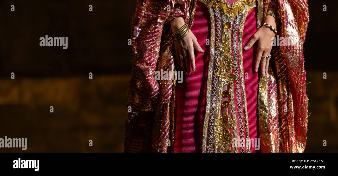 Closeup of women in egyptian clothes, theatrical costume. Aida opera by ...