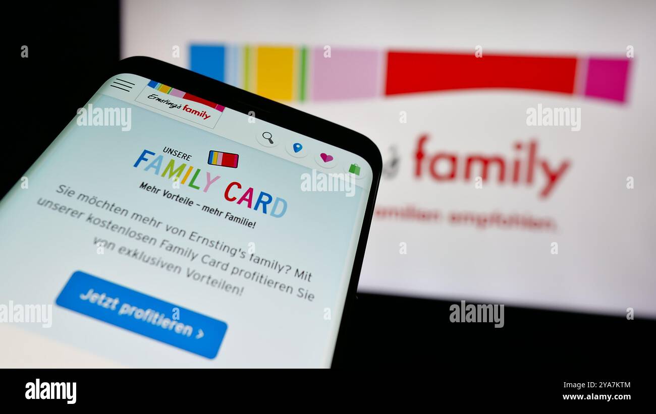 Smartphone with website of retail company Ernsting’s family GmbH Co. KG ...