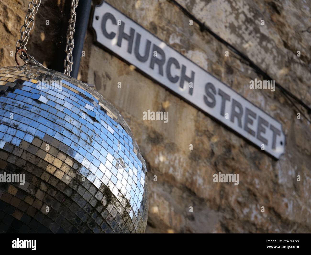 A glitter ball hangin on Church Street in Tetbury, Cotswolds Stock ...