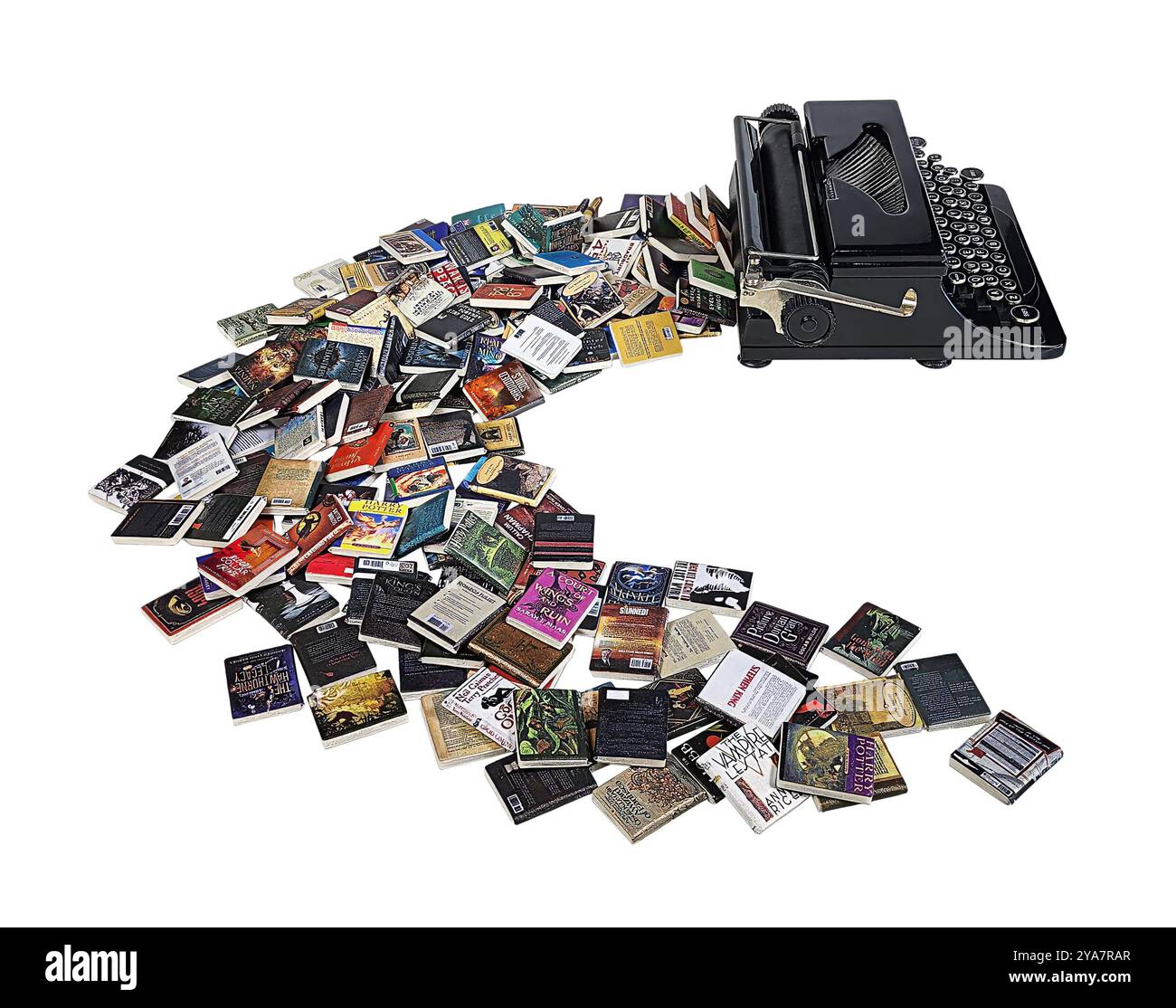 Vintage metal typewriter for typing up books that show up behind it ...