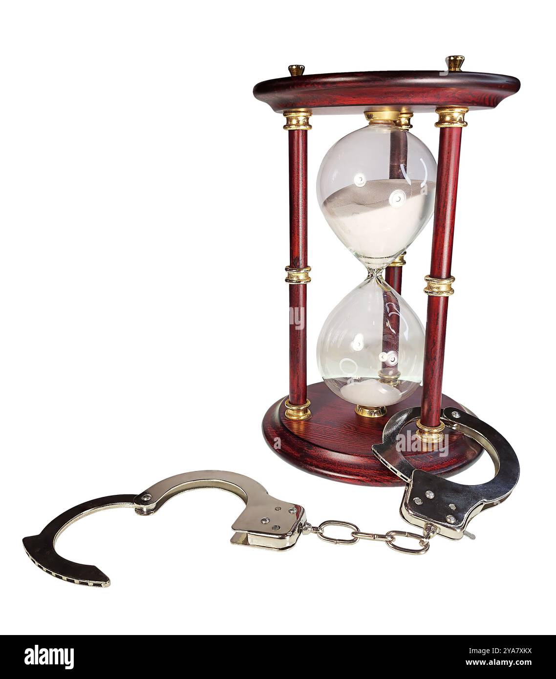 Old fashioned wood and glass hourglass for telling time with handcuffs ...