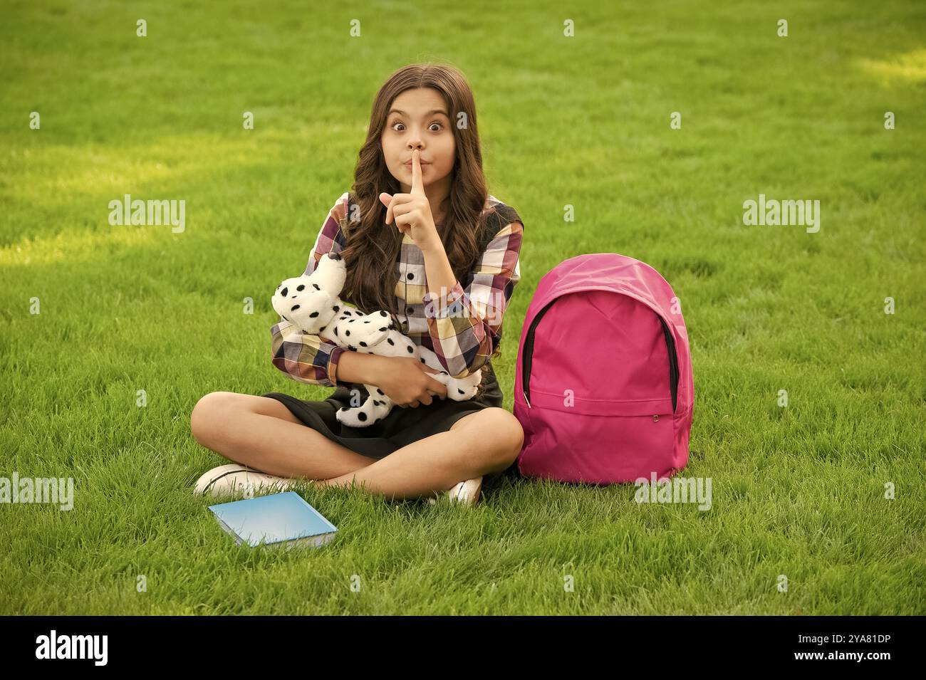 Teen girl making shush gesture after school, education. back to school ...