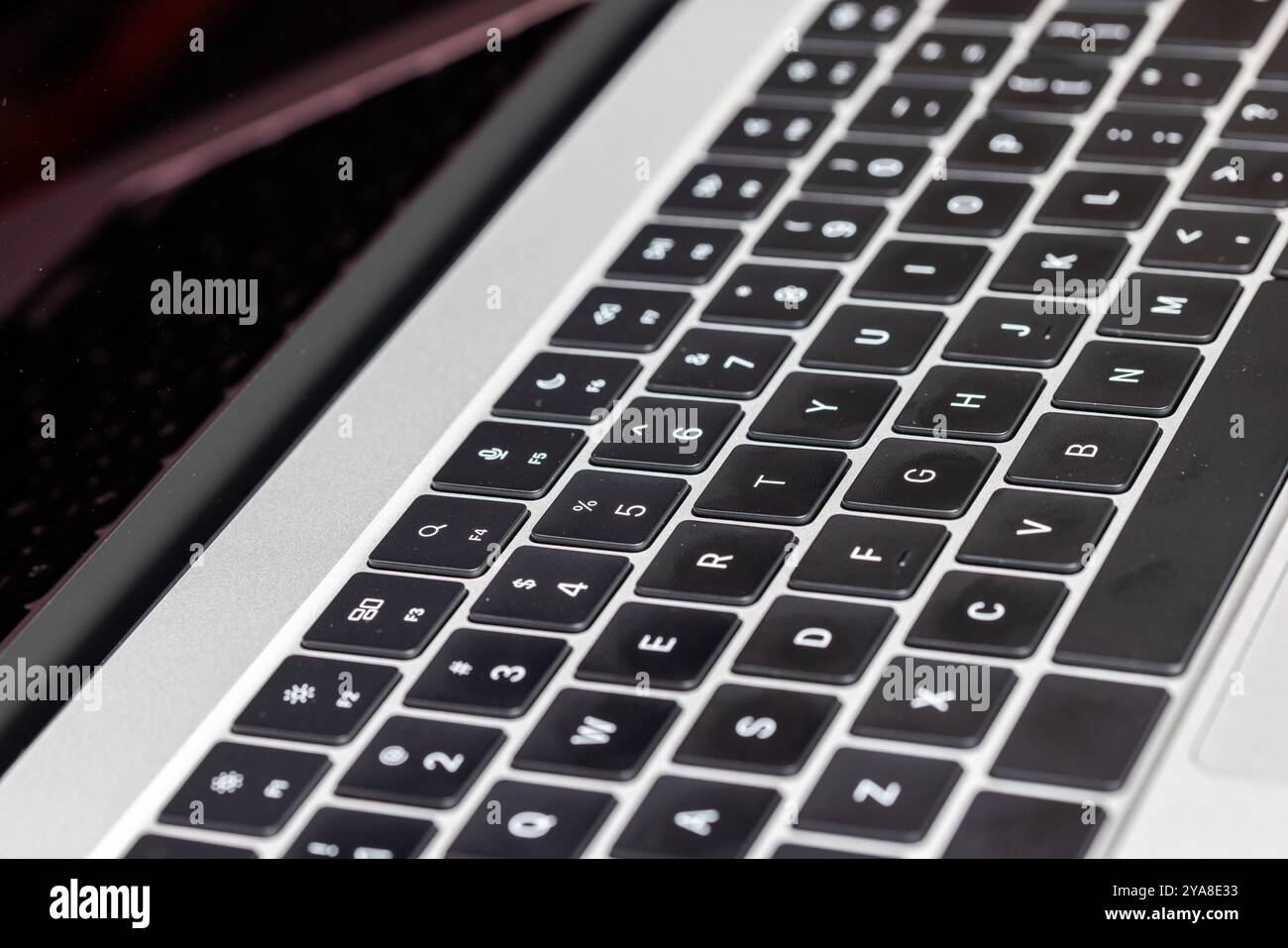 keyboard of famous silver colored laptop with fingerprints Stock Photo ...