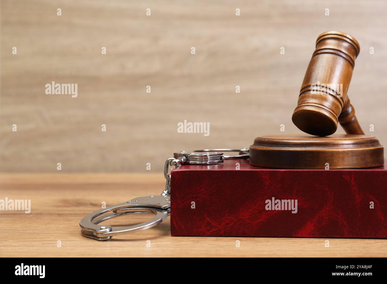 Handcuffs book judges gavel hi-res stock photography and images - Alamy