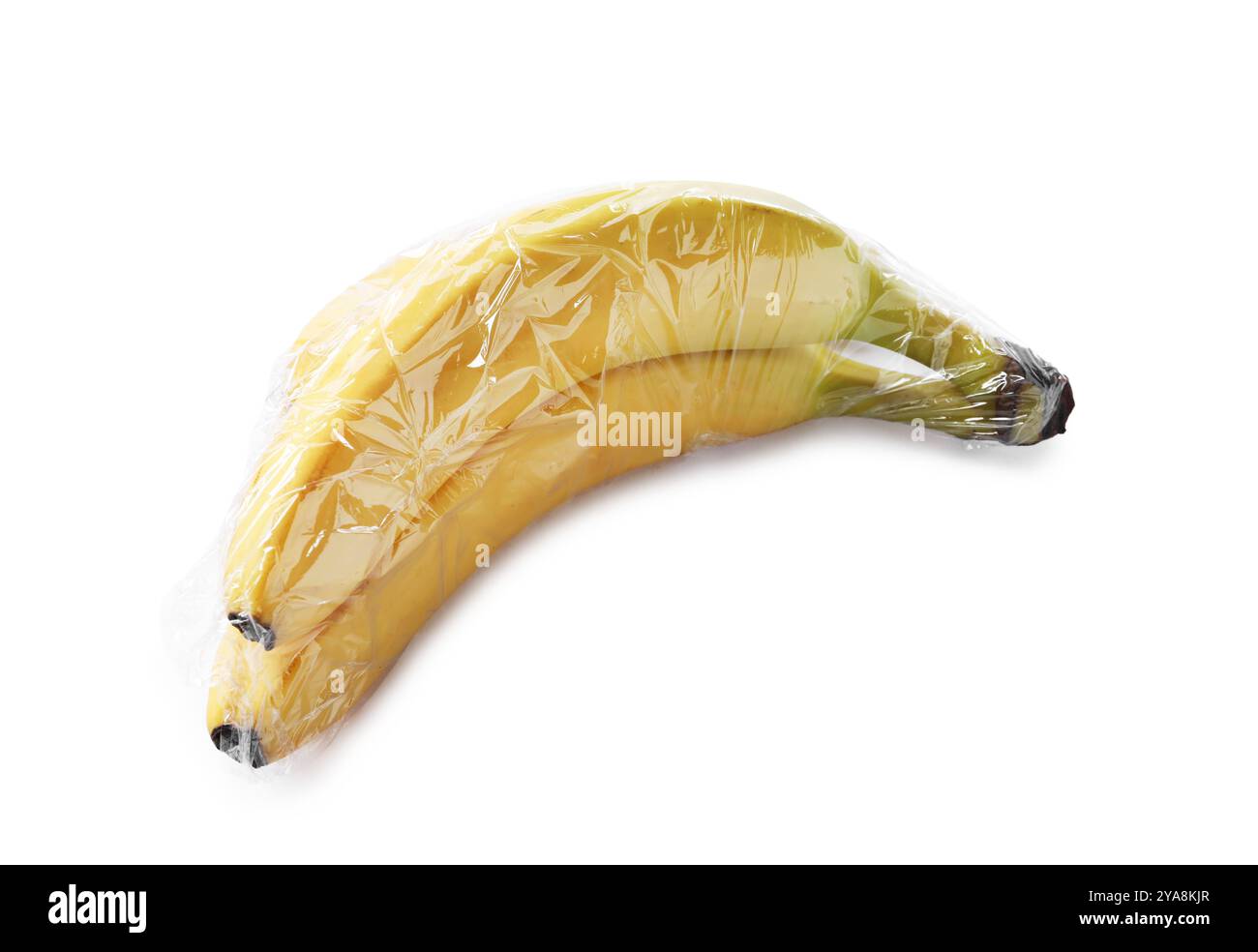 Fresh bananas with plastic food wrap isolated on white Stock Photo - Alamy
