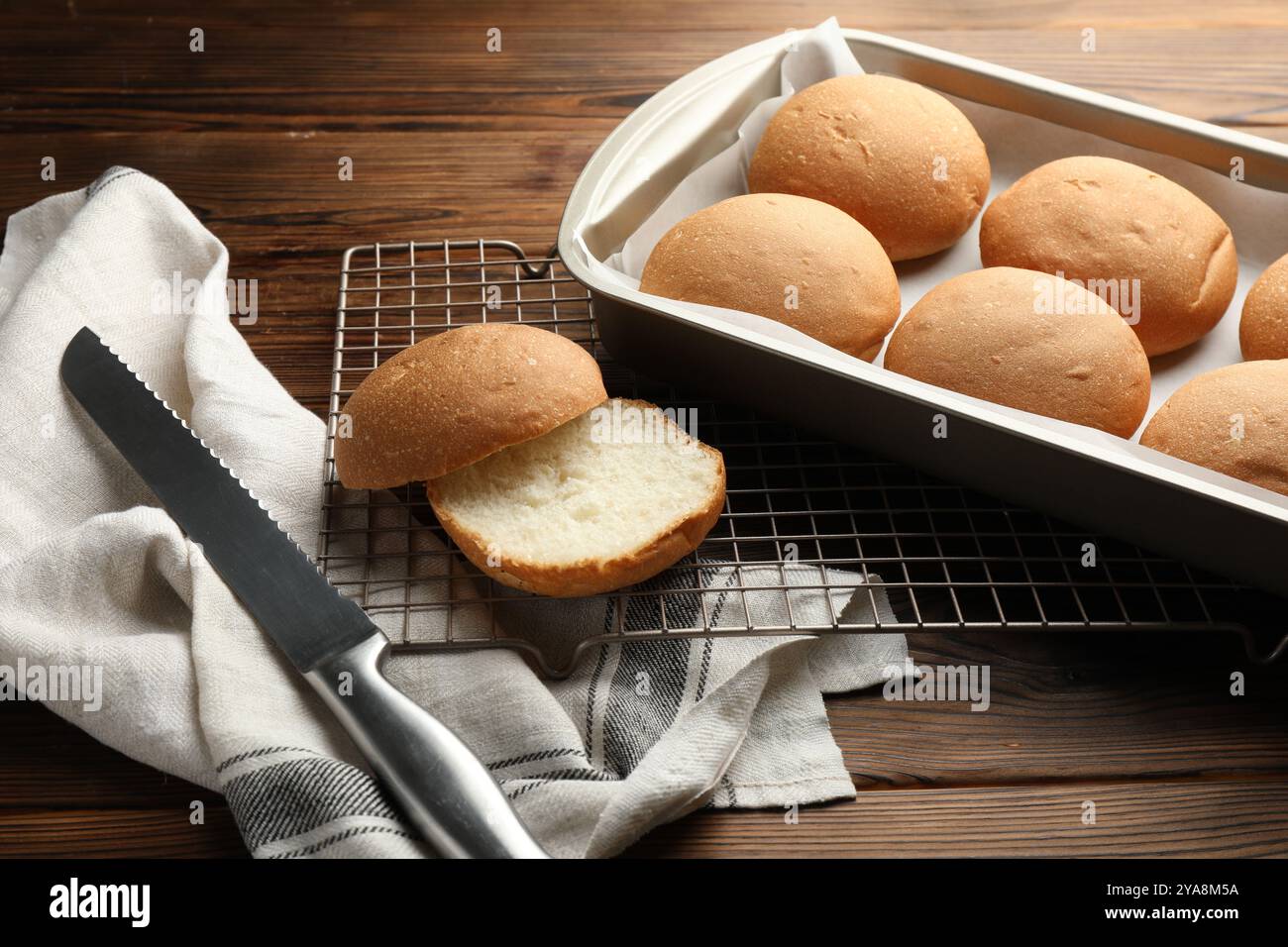 Fresh tasty buns knife hi-res stock photography and images - Alamy