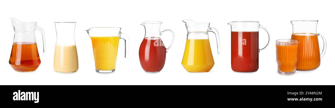 Glass jugs with different juices isolated on white, set Stock Photo - Alamy