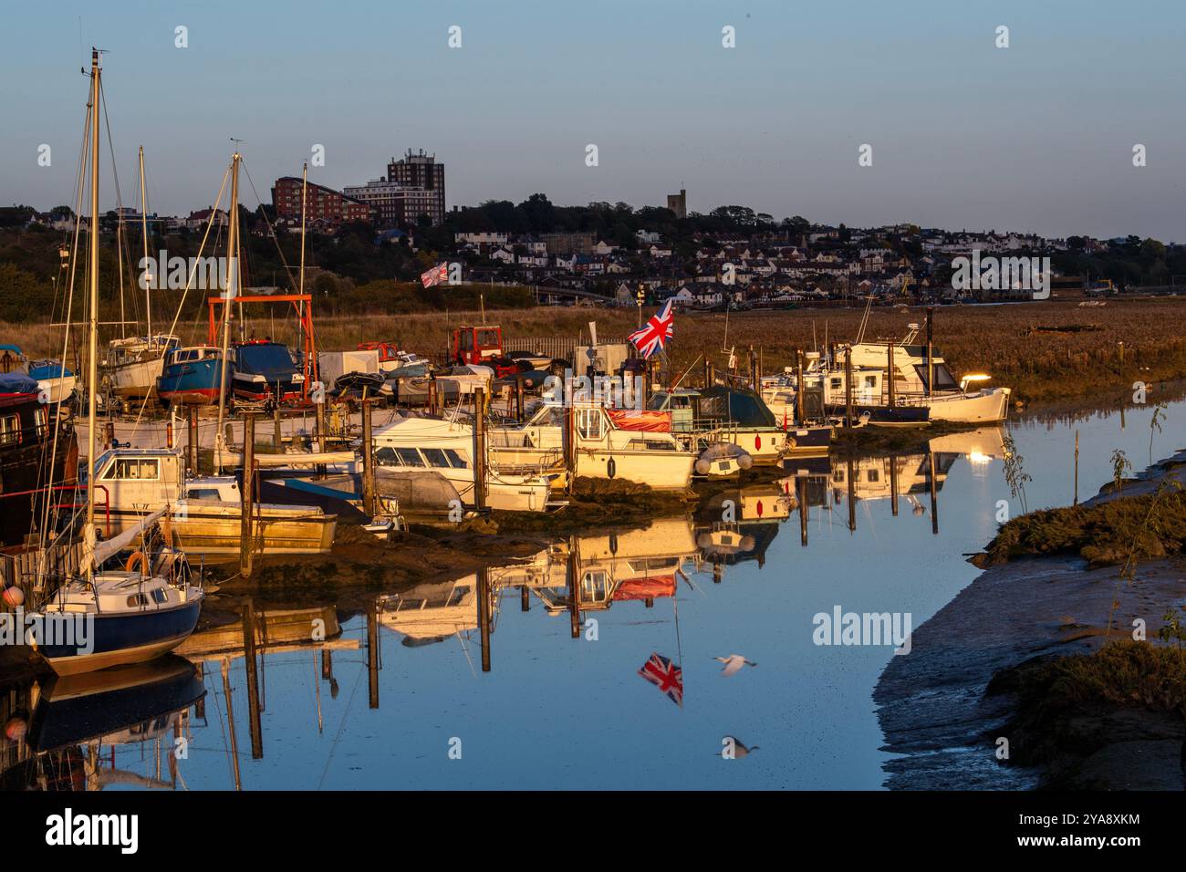 Sunset across the lagoon from the RSPB bird hide at Two Tree Island ...