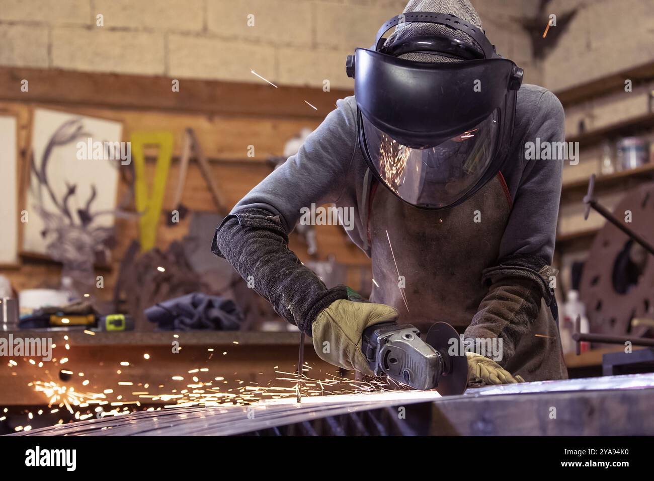 Welding Sparks Illuminate Workshop A Skilled Metalworker Engaged in ...
