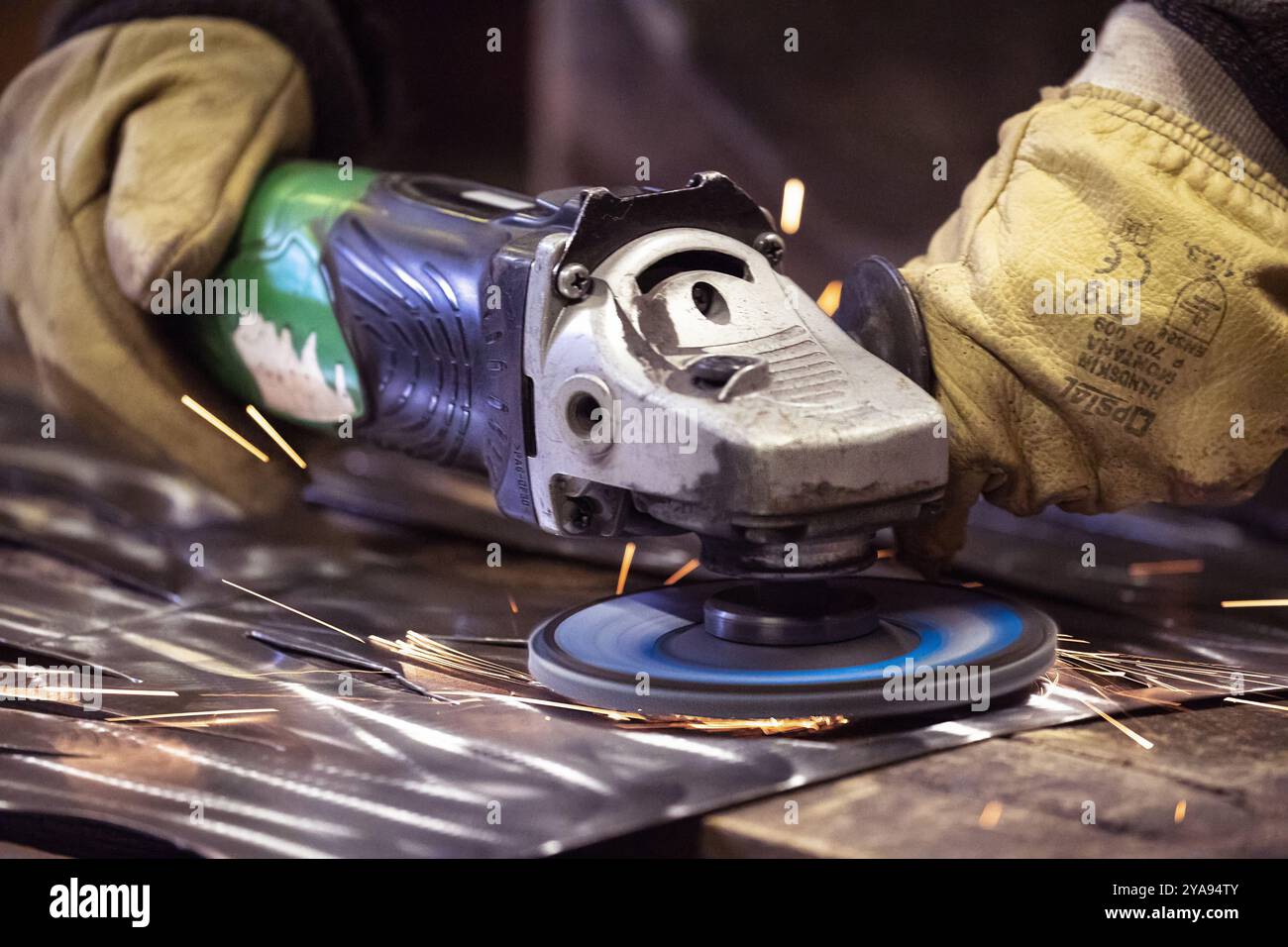 Using a handoperated angle grinder is essential for various ...