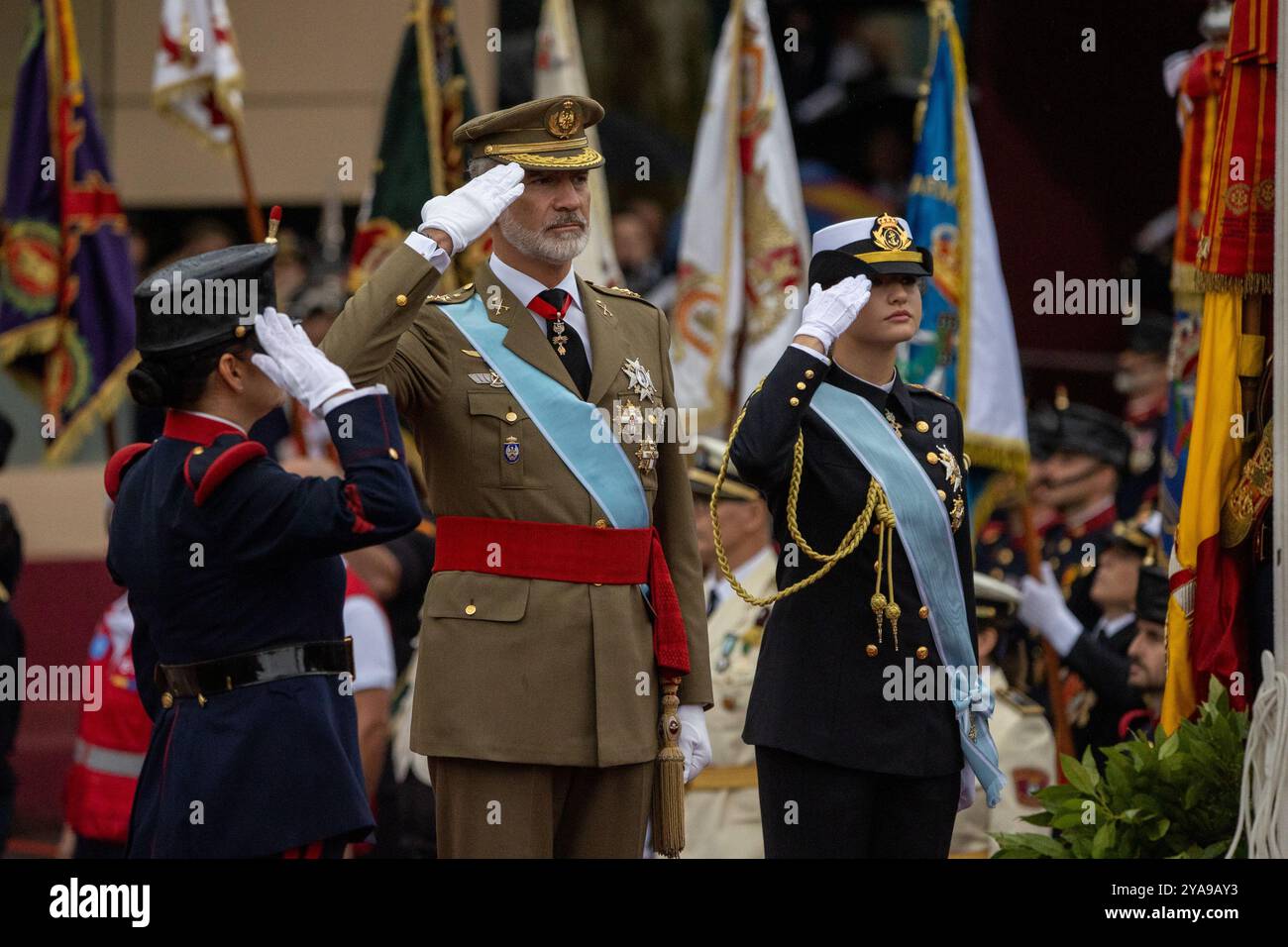 King Felipe VI (L) and Princess Leonor (R) salute in front of the ...