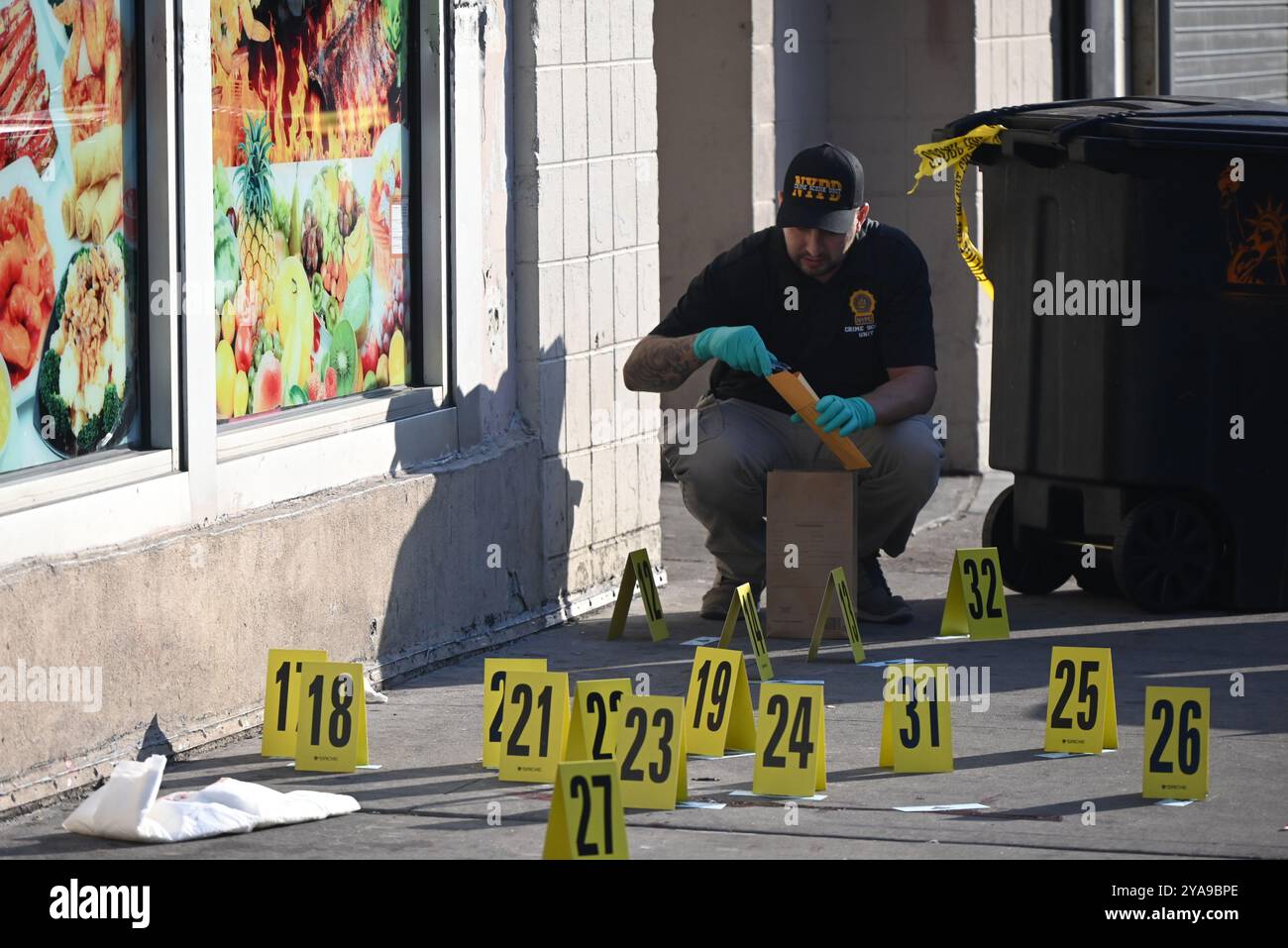Brooklyn, New York, USA. 12th Oct, 2024. NYPD crime scene investigators ...