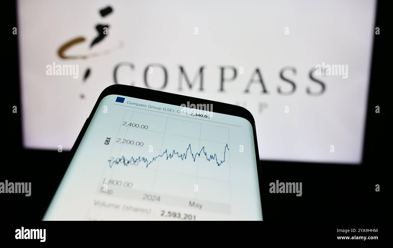 In this photo illustration, a mobile phone with the website of British ...