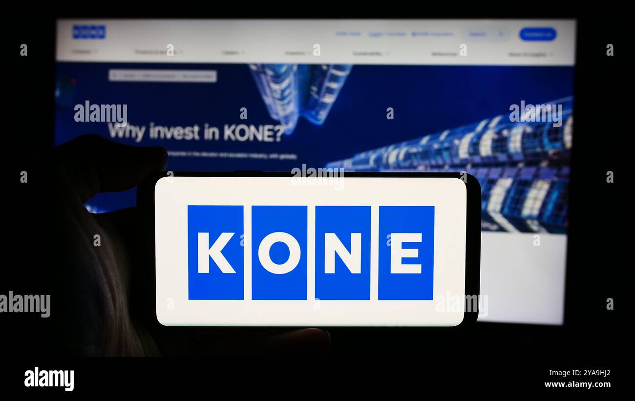 In this photo illustration, a person is holding a cellphone with the ...