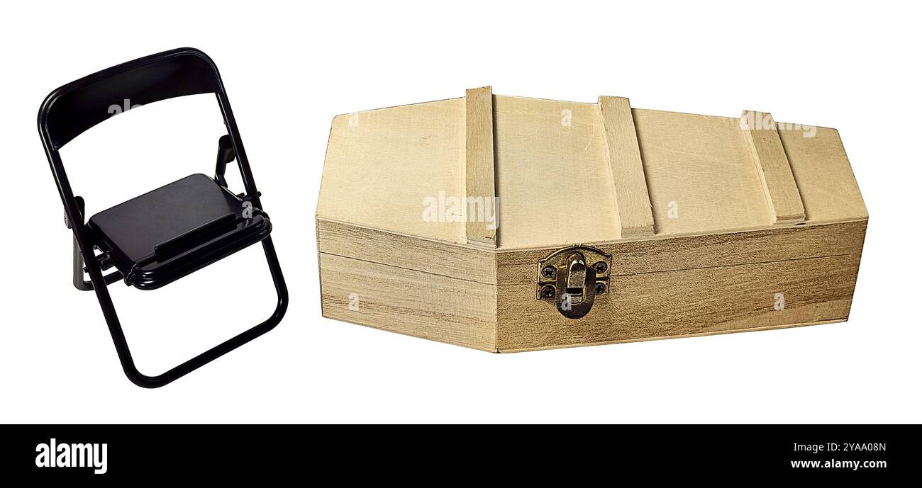 Folding chair and coffin during wake before burial Stock Photo - Alamy