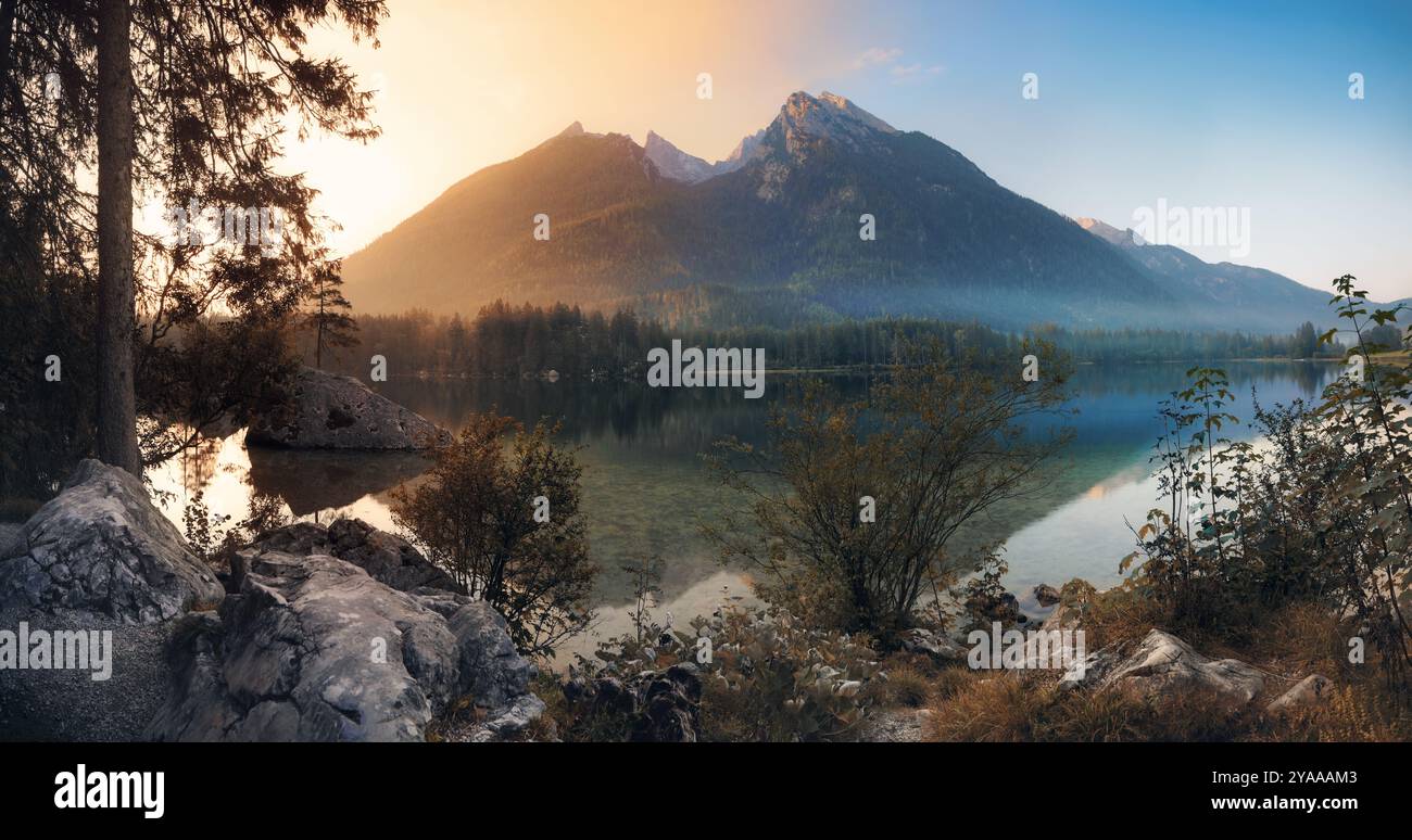 Majestic mountains in the German Alps reflected in a scenic lake at ...