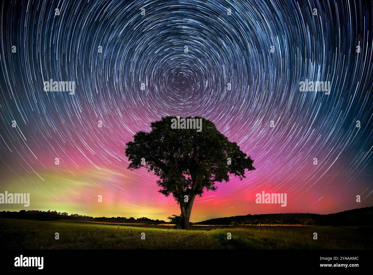 Northern lights stars startrails hi-res stock photography and images ...