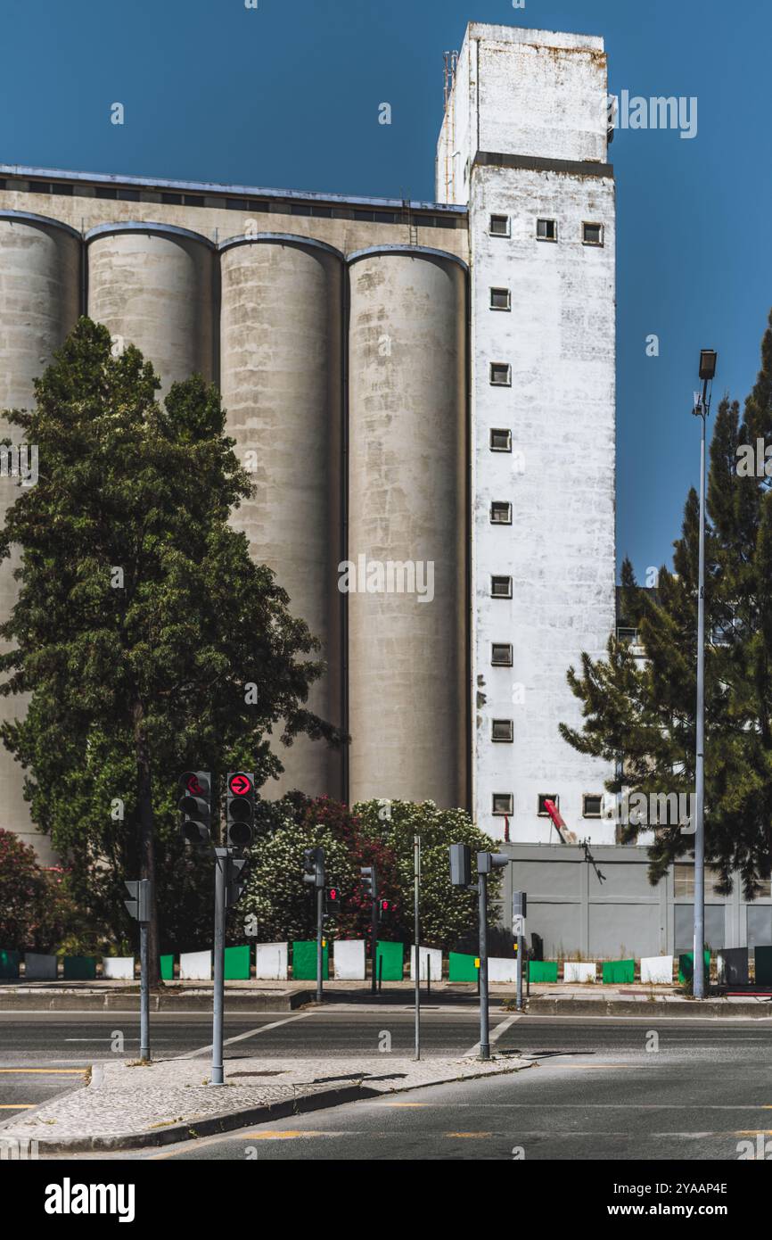 Industrial grain silo structure with tall concrete cylindrical storage ...