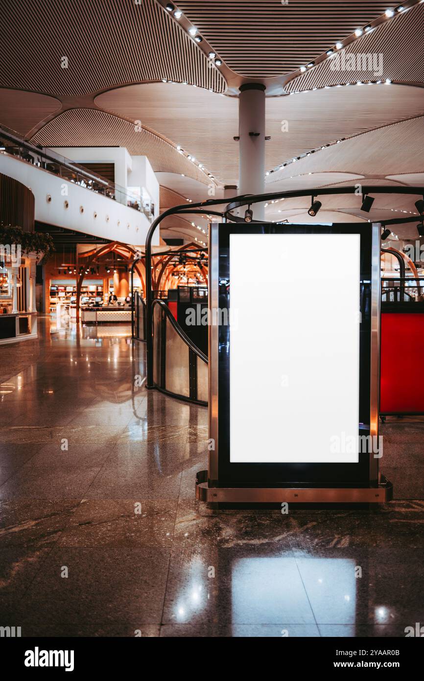 A blank, vertical advertisement display screen mockup stands in a ...