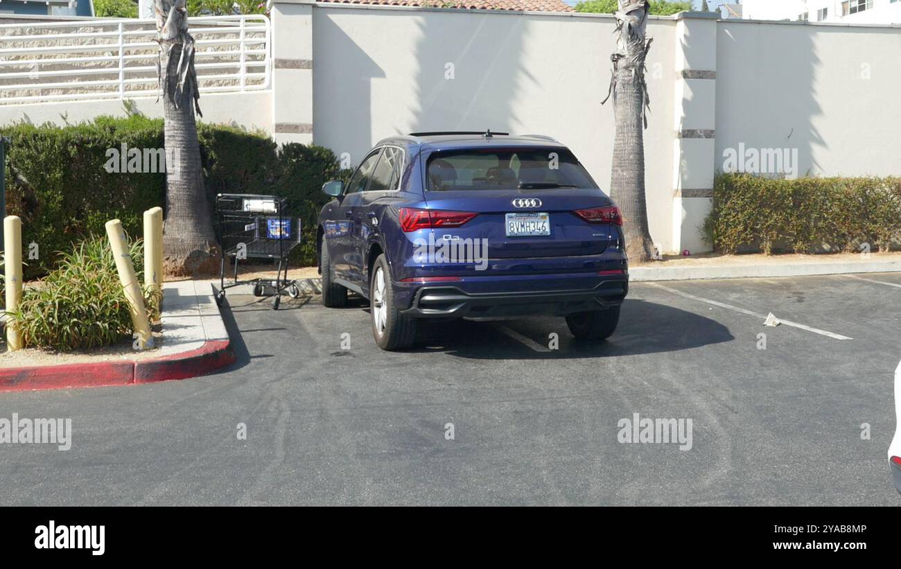 Los Angeles, California, USA 12th October 2024 Car parked in two parking spots on October 12 ...