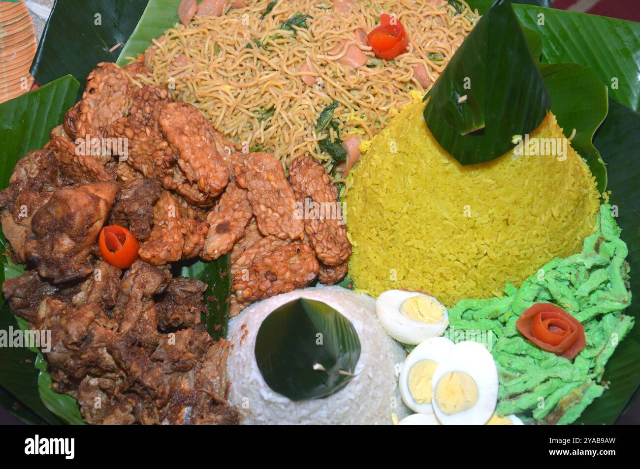 nasi tumpeng, traditional Javanese food, complete food with side dishes ...